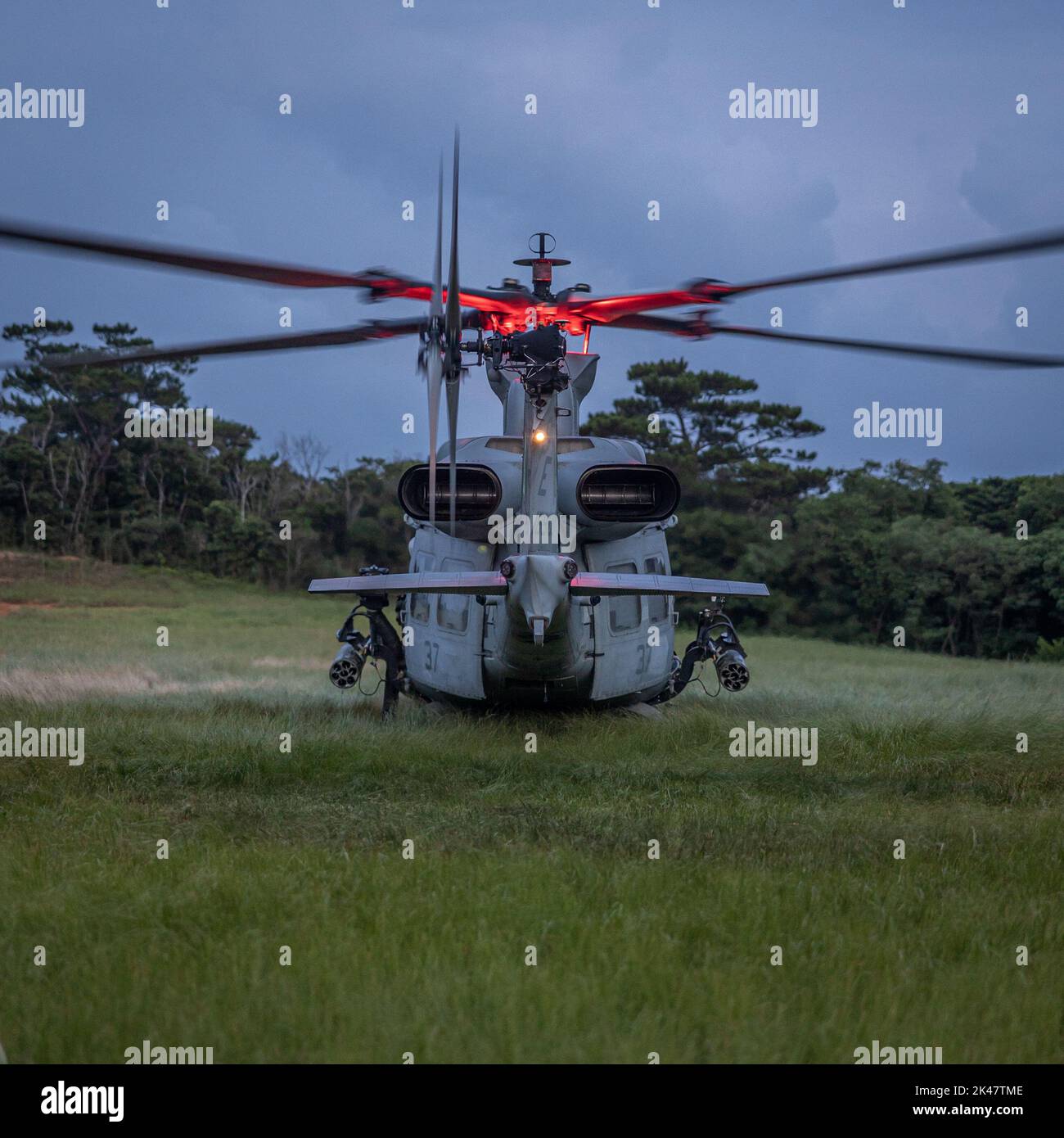 U.S. Marine Corps UH-1Y Venom helicopter crew chiefs with Marine Light ...