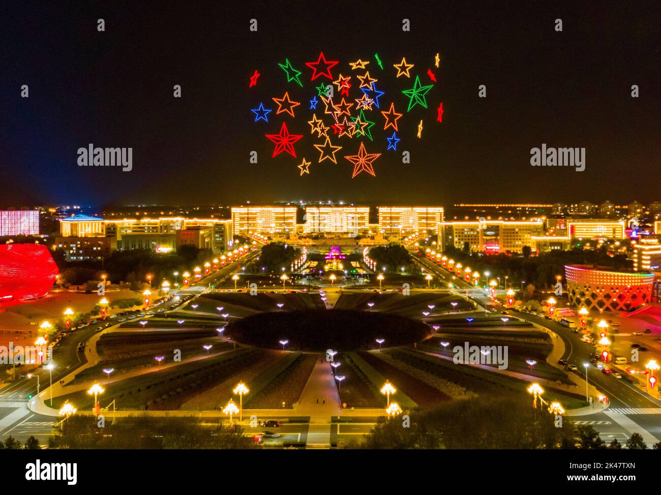 ORDOS, CHINA - SEPTEMBER 30, 2022 - A cluster of drones performs a ...