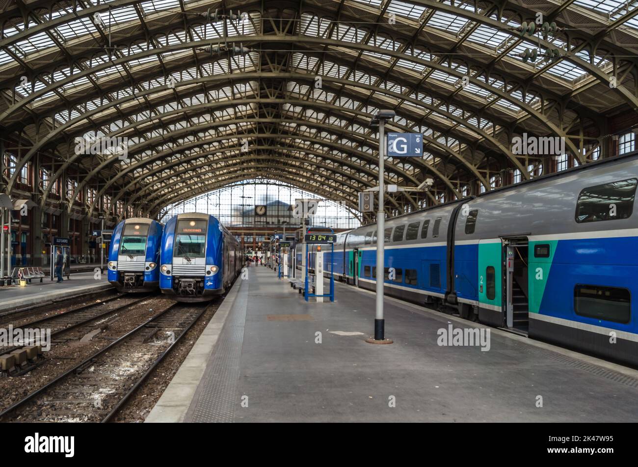 LILLE, FRANCE - AUGUST 17, 2013: Trains at Lille-Flandres railway ...