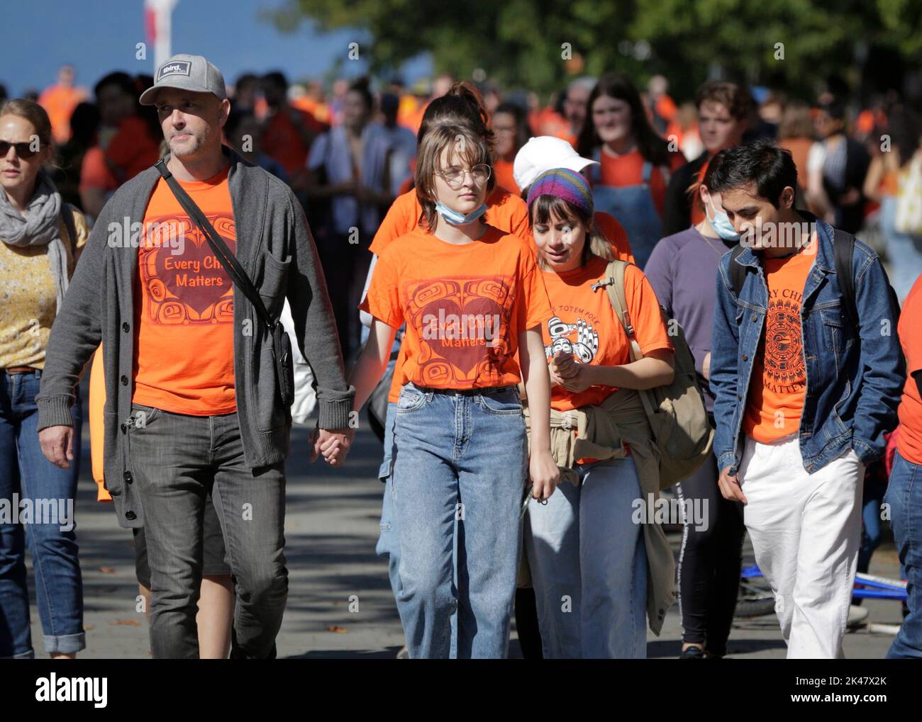 Vancouver, Canada. 30th Sep, 2022. People wearing orange T-shirts ...