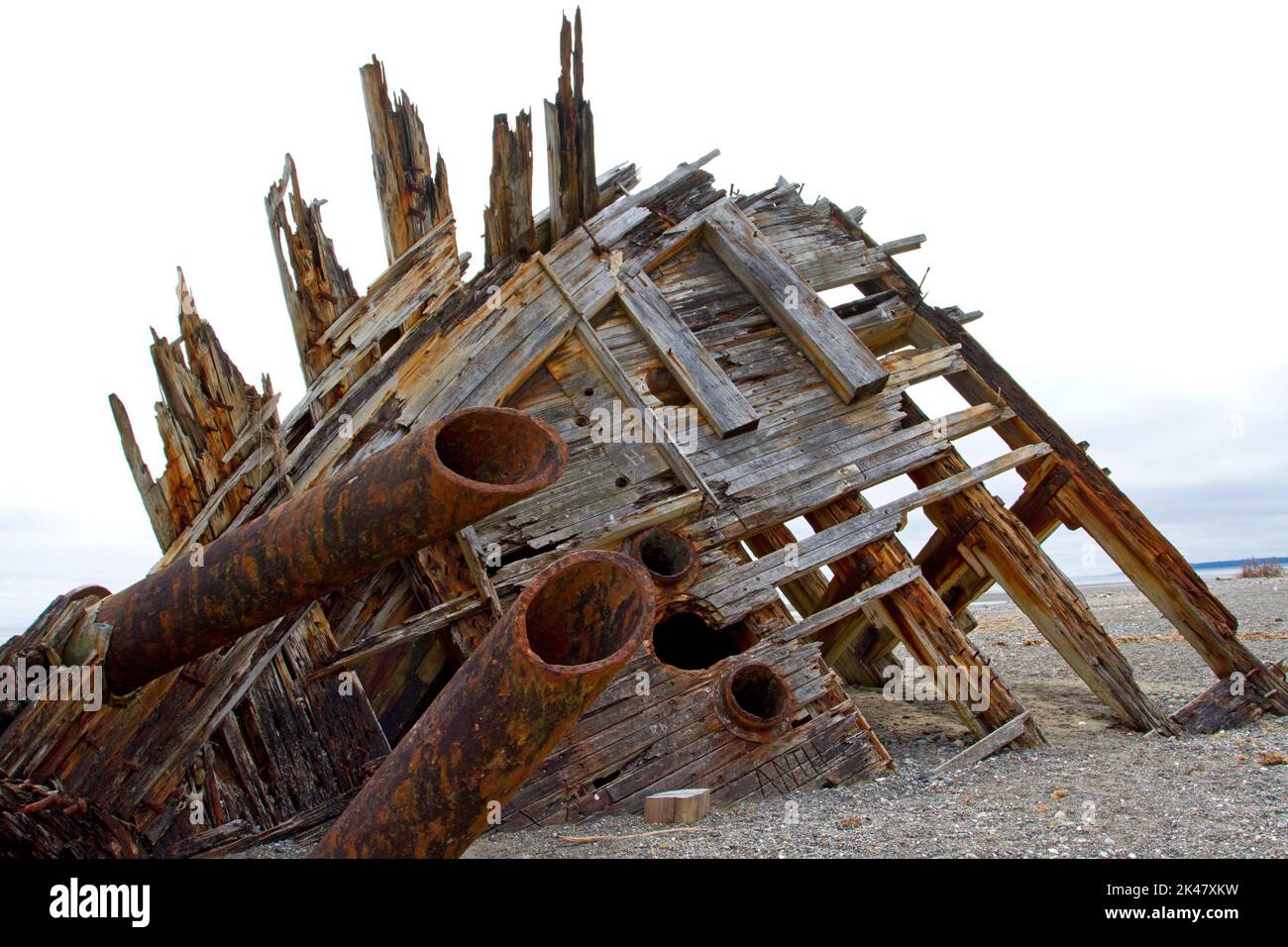 The remaining hull of the Pesuta shipwreck lying in sand north of Tlell ...