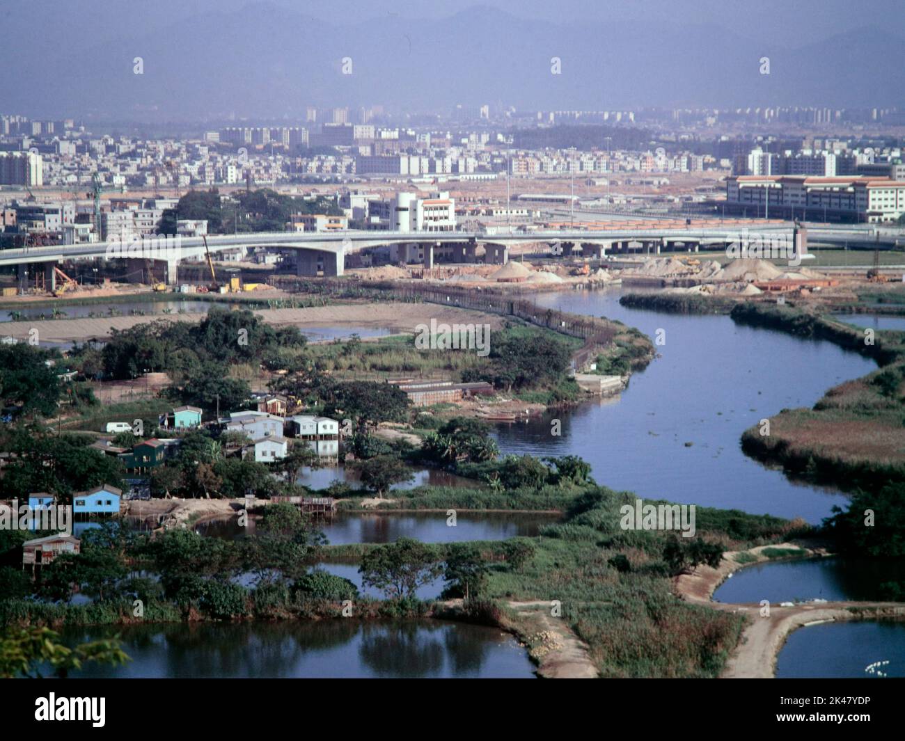 Ha Wan Village and Shenzhen River, (centre right), viewed from Lok Ma ...
