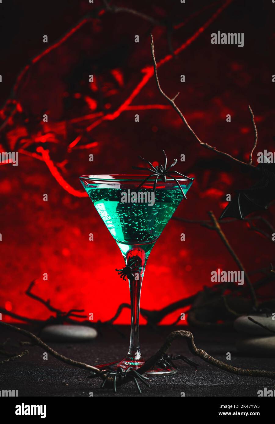 Halloween witch potion alcoholic cocktail on scary dark red background ...