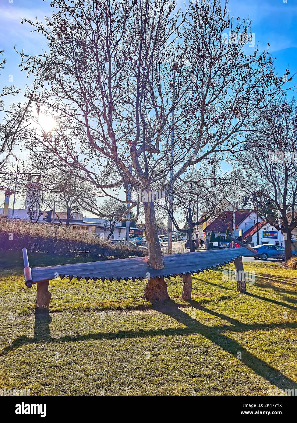 The monument, named Do not cut a tree with a large two-man saw in park ...