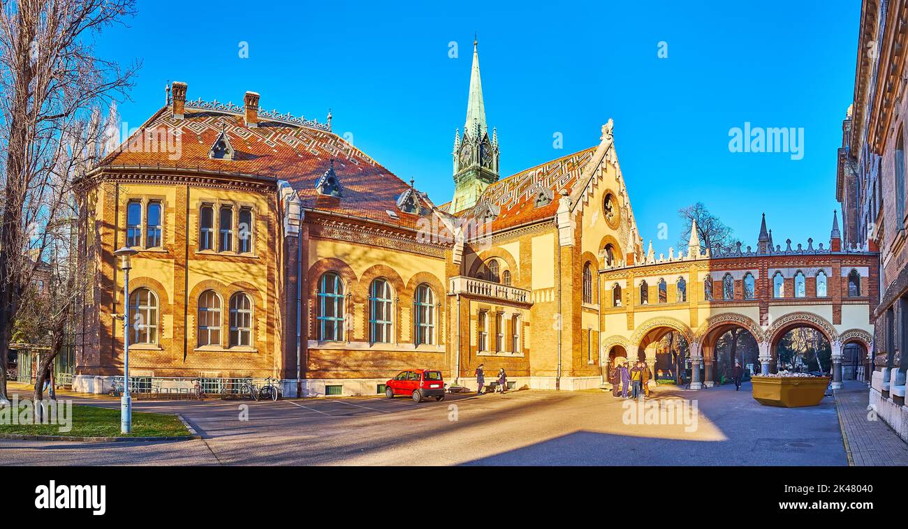 Panorama of the suny alley in front of historic Library building of ...