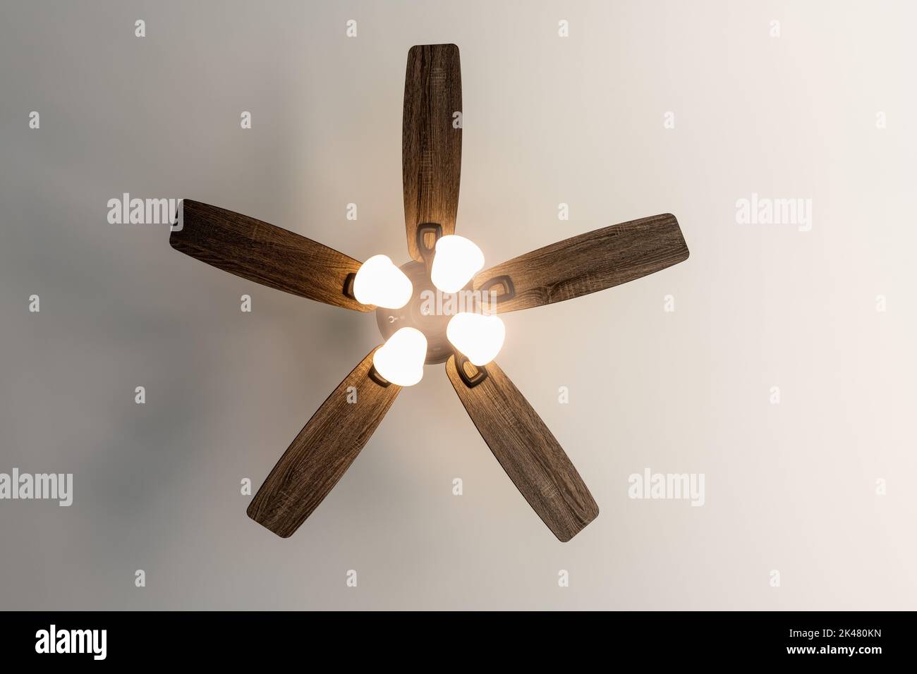 Residential ceiling fan in motion on a white ceiling Stock Photo - Alamy