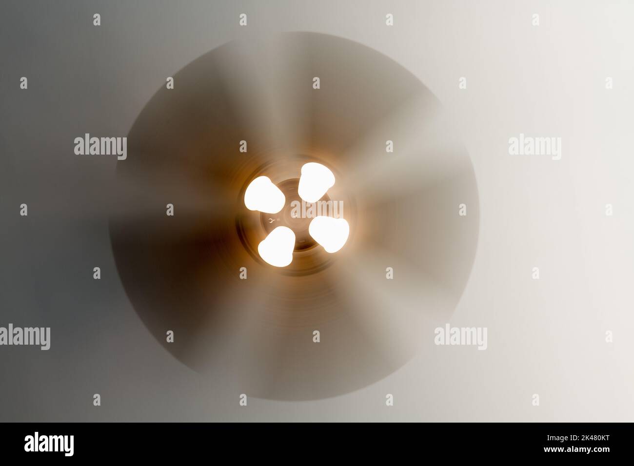 Residential ceiling fan in motion on a white ceiling Stock Photo - Alamy