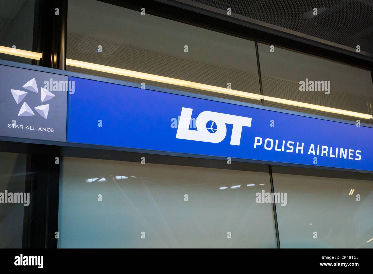 Warsaw, Poland - July 2019: Lot Polish Airlines ticket office in Warsaw Chopin Airport in Poland ...