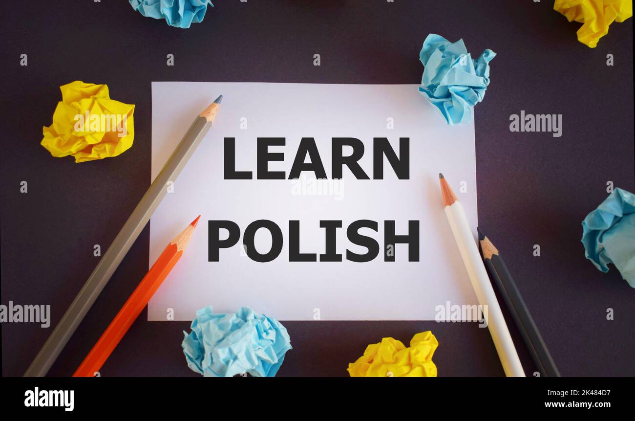 learn polish. text written on white paper,Pencils over white paper ...