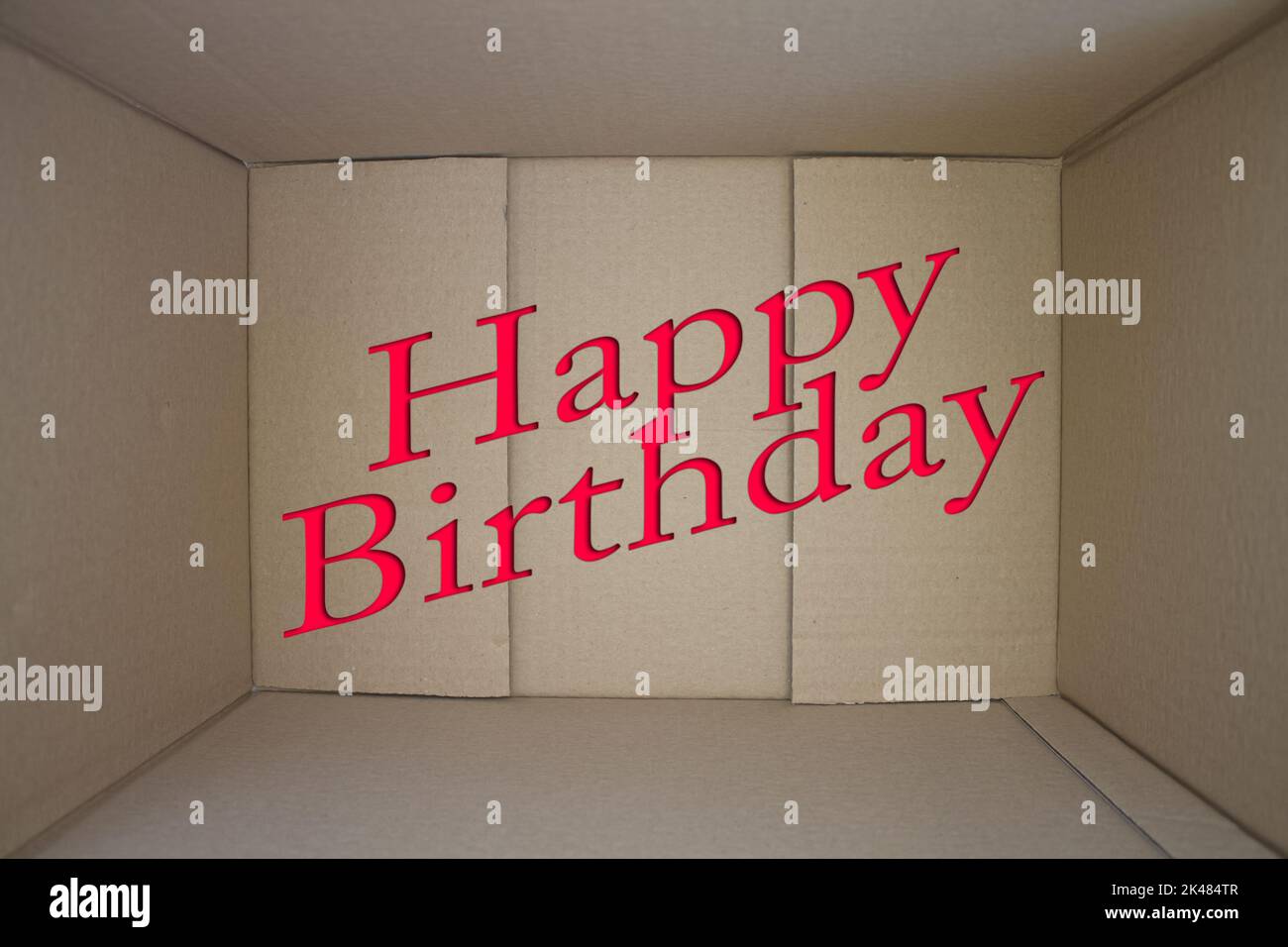 Happy Birthday word with cardboard box. Brown folded card box Stock ...