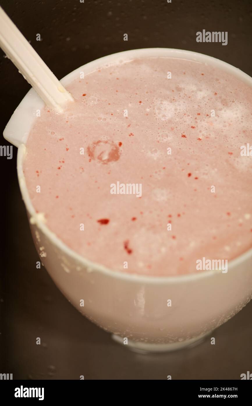 round bowl with the remains of piping filling bag and spatula Stock ...
