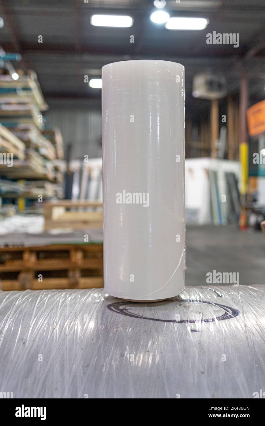 White plastic wrap used for shipping to customers Stock Photo - Alamy