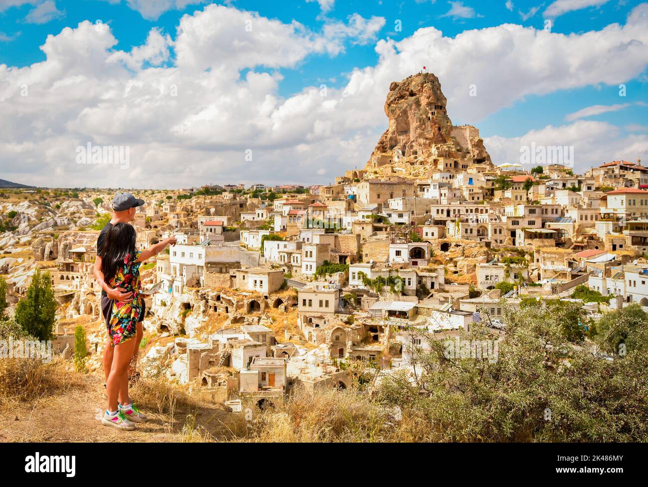 Happy young tourist couple man and woman on vacation Turkey watching ...