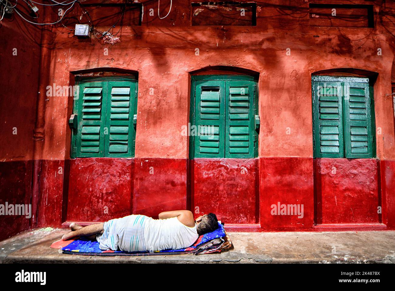 Homeless man seen sleeping hi-res stock photography and images - Alamy