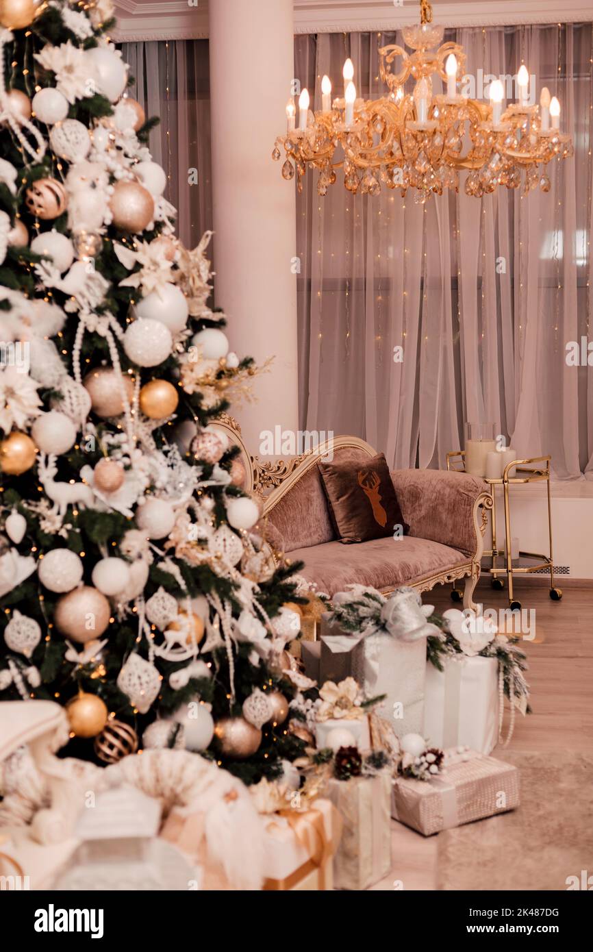 Chic Christmas tree in a luxurious interior New Year's Eve Stock Photo ...