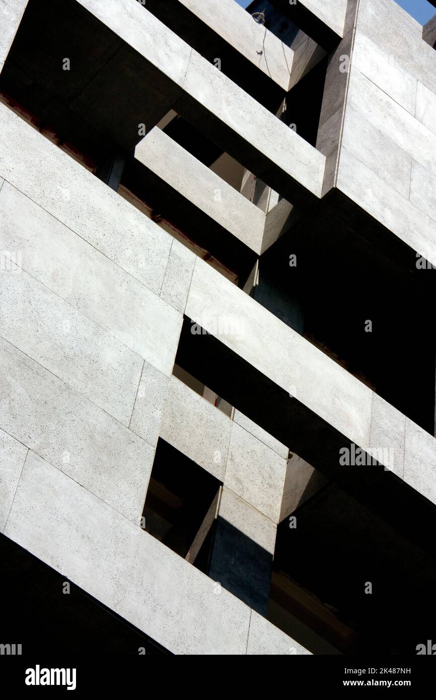 A minimal photo of concrete building with geometric forms. Modern ...