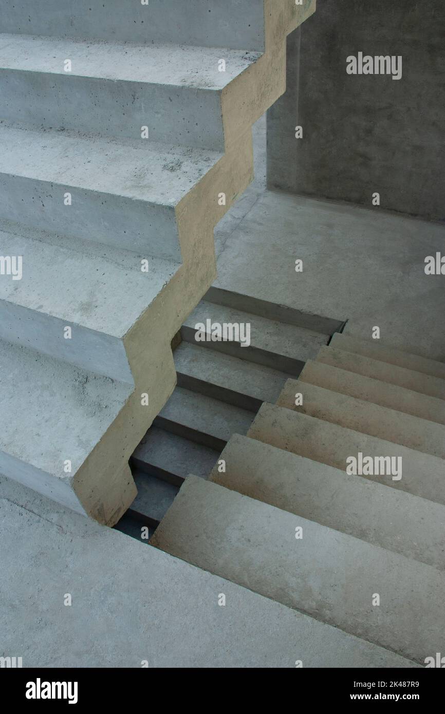 Stairs of a modern concrete building that created geometric shapes ...