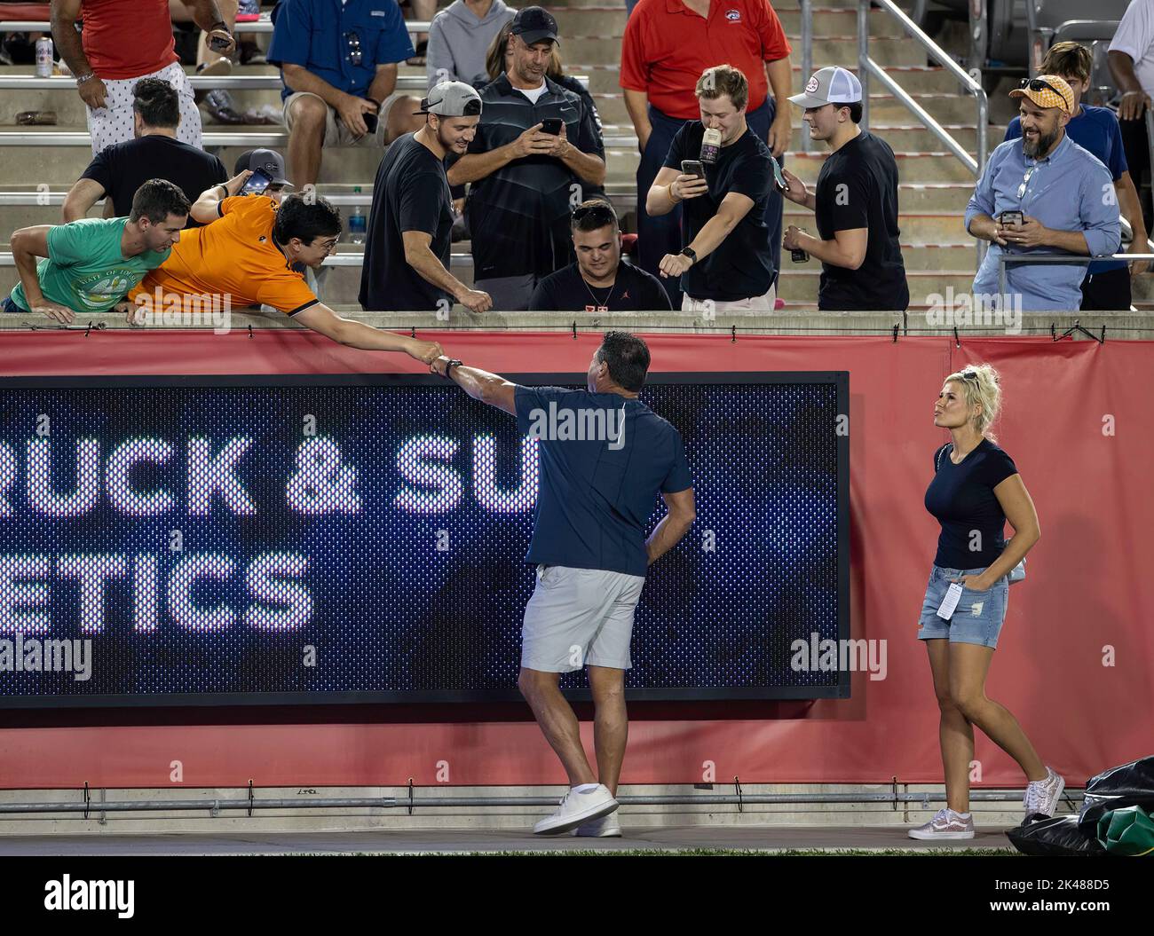 September 30, 2022: Former USC and LSU head coach Ed Orgeron greets fans during an American ...