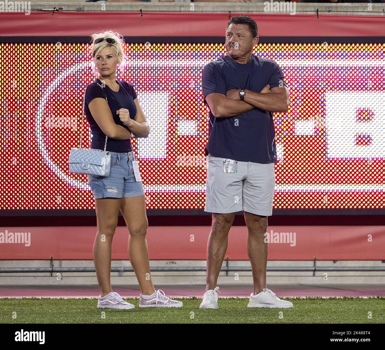 September 30, 2022: Former USC and LSU head coach Ed Orgeron (right) and girlfriend Bailie ...