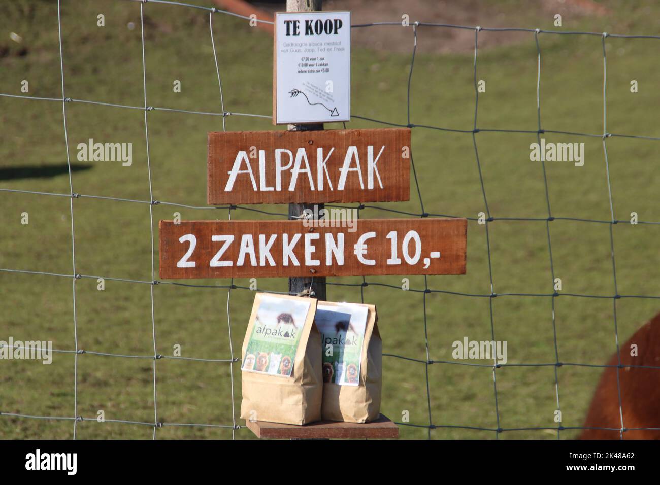 Alpaca droppings in bags for manure for sale at farm in Nieuwerkerk aan ...