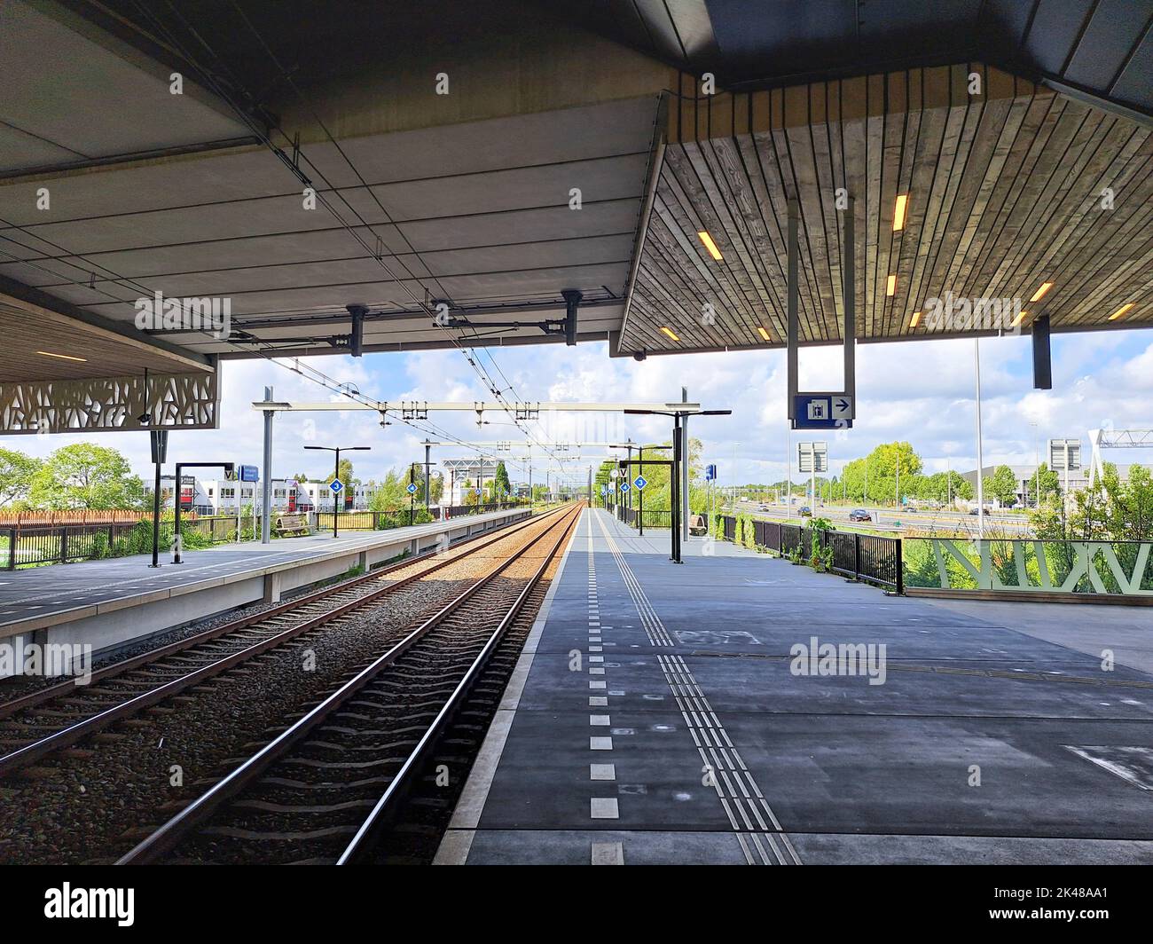 RegioCitadas lightrail tram as streetcar of HTM on rooftop of station ...