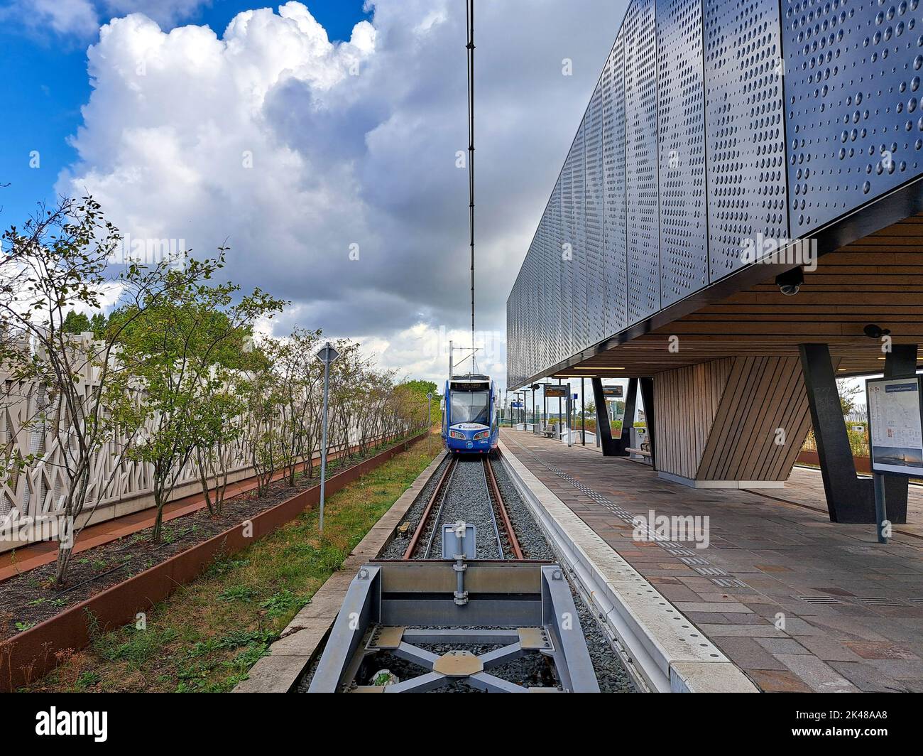 RegioCitadas lightrail tram as streetcar of HTM on rooftop of station ...