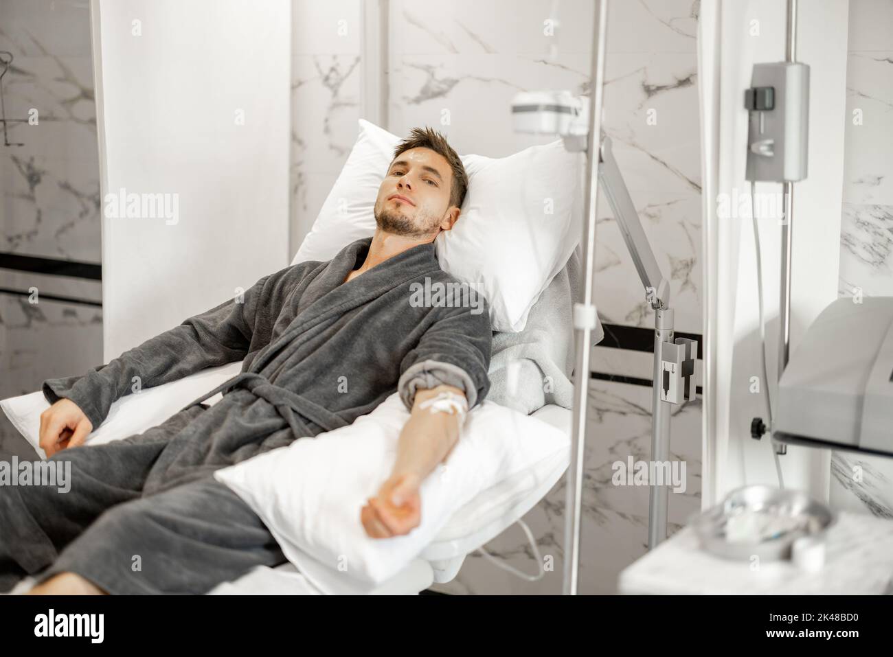 Man during blood wash procedure at medical centre Stock Photo - Alamy