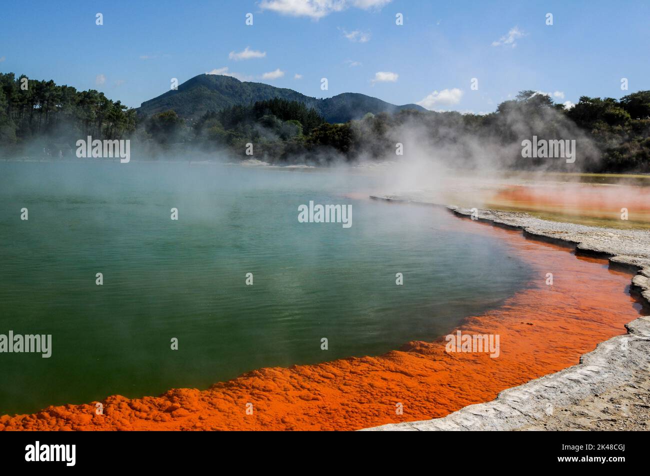 Steam raise above the vivid Antimony orange colour that forms around ...
