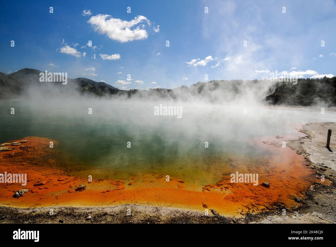 Steam raise above the vivid Antimony orange colour that forms around ...