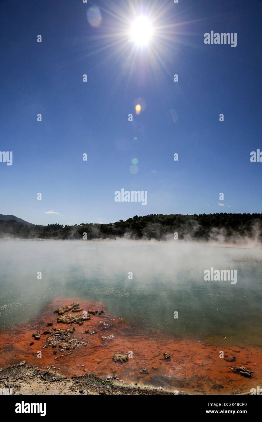 Steam raise above the vivid Antimony orange colour that forms around ...