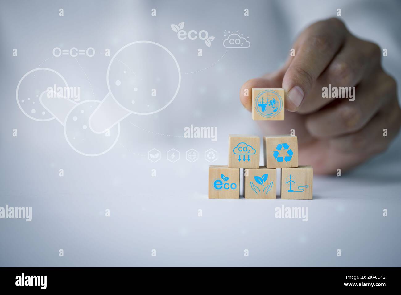 Technology, hand holding with environment Icons over the Network ...