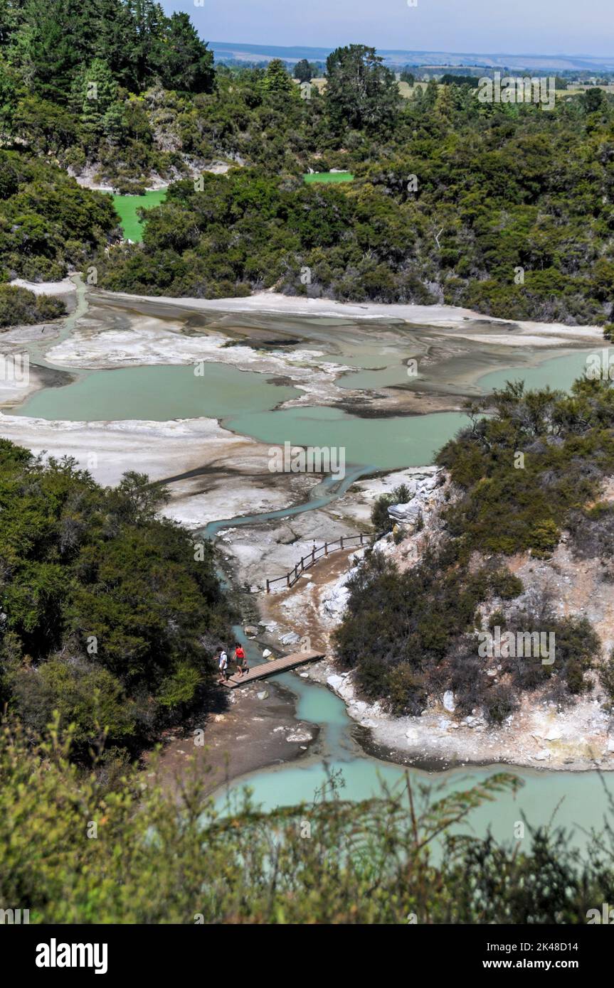 A couple of visitors crossing a boardwalk between Alum Rock and the ...