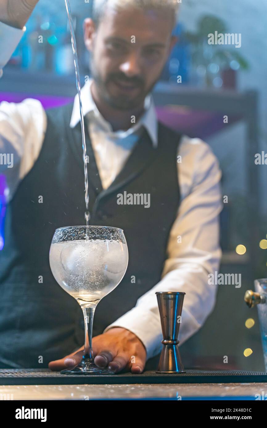 Professional barman in white shirt hi-res stock photography and images ...
