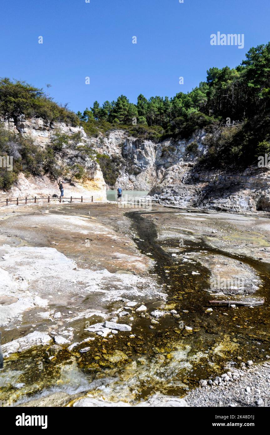 A couple of visitors crossing a boardwalk between Alum Rock and the ...