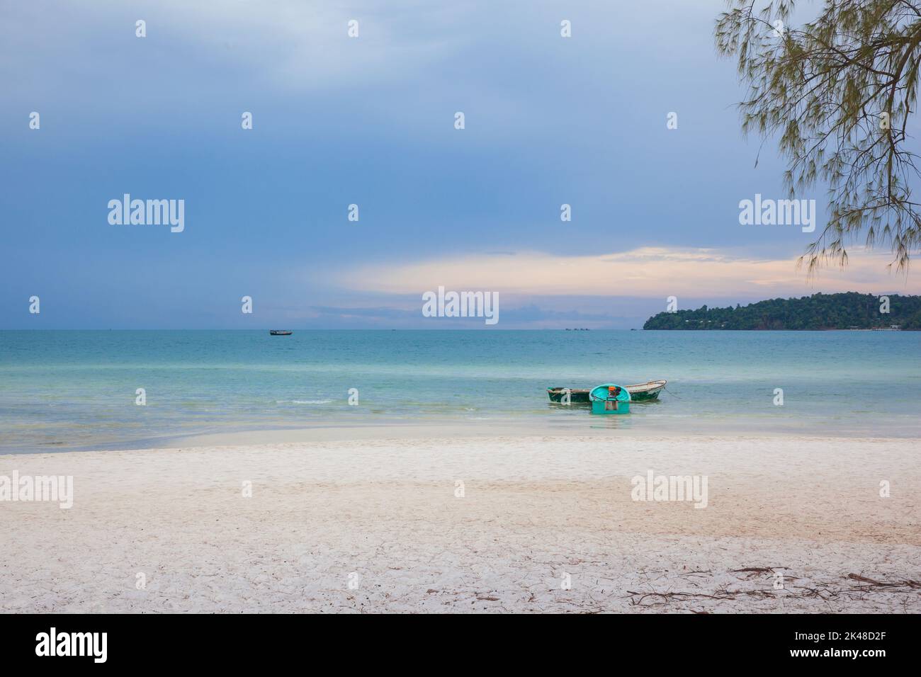 Blue boat in beautiful beach, blue water and blue sky at Saracen Bay ...