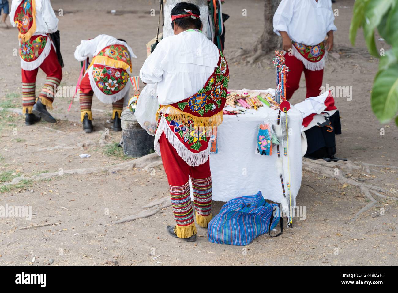 Mexican dance of the Flyers men on traditional clothing getting ready ...