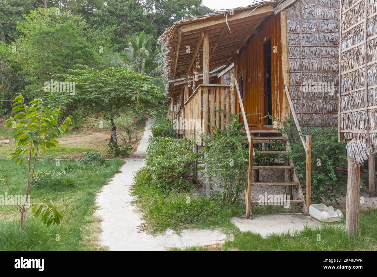 Rattan house with green grass in Koh Rong island, Cambodia Stock Photo ...