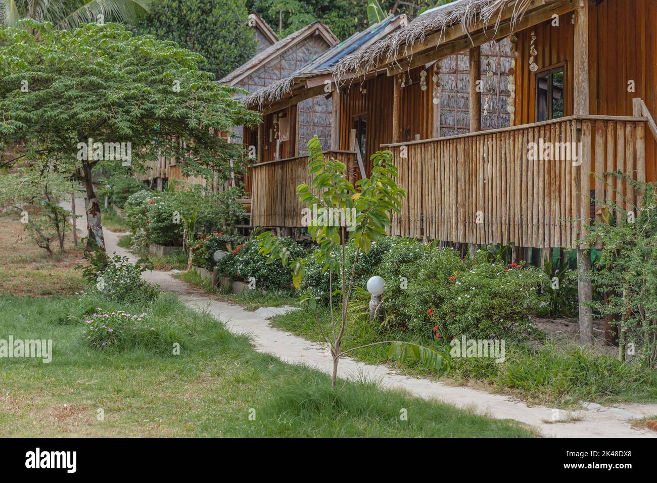 Rattan house with green grass in Koh Rong island, Cambodia Stock Photo ...