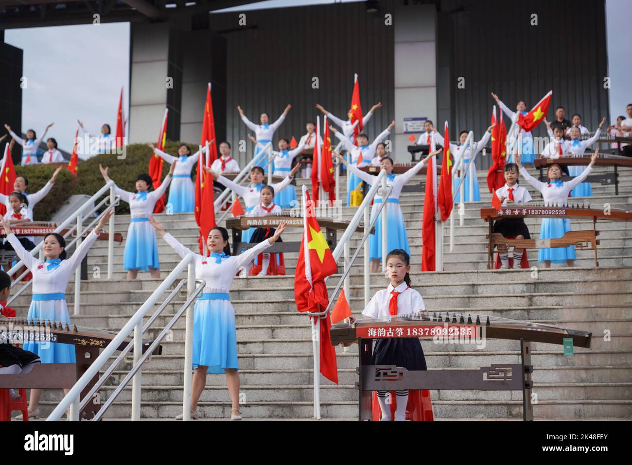 GUILIN, CHINA - OCTOBER 1, 2022 - Thousands of cheongsam fans perform ...