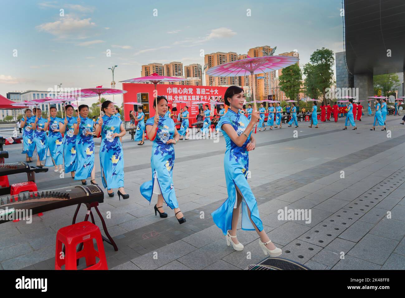 GUILIN, CHINA - OCTOBER 1, 2022 - Thousands of cheongsam fans perform ...