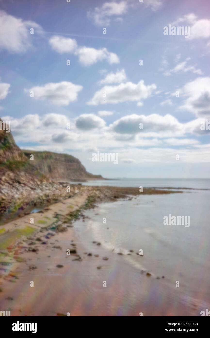 Stylised Rock a Nor beach and cliff landscape. Age-defying, digital age ...