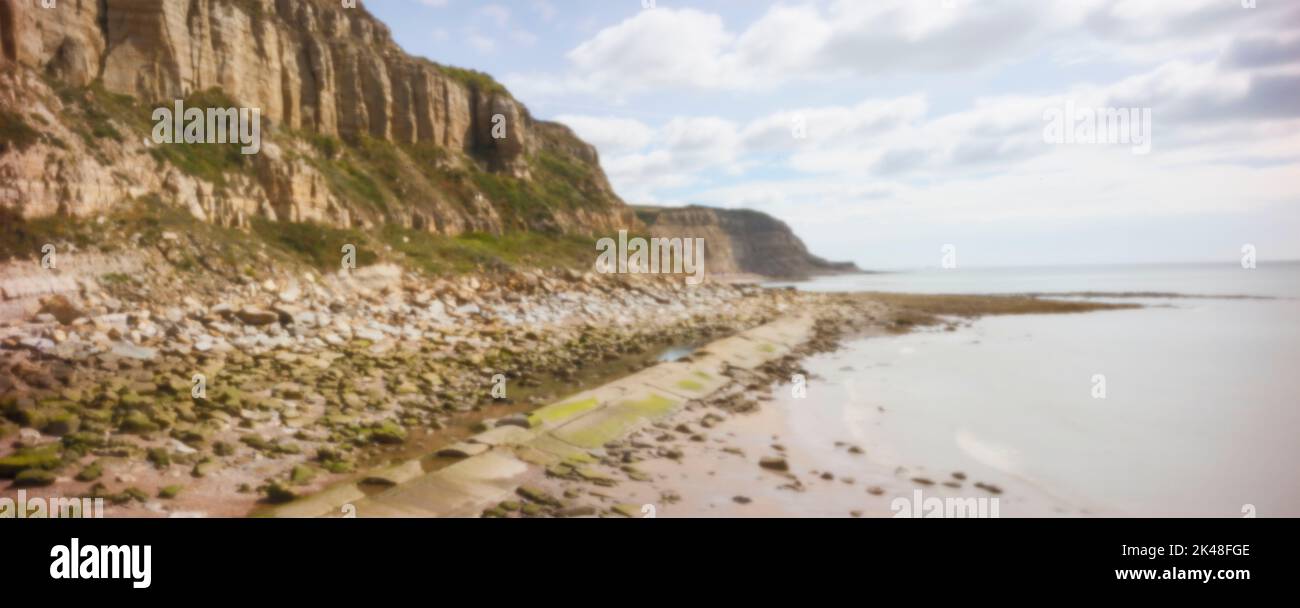 Stylised Rock a Nor beach and cliff landscape. Age-defying, digital age ...
