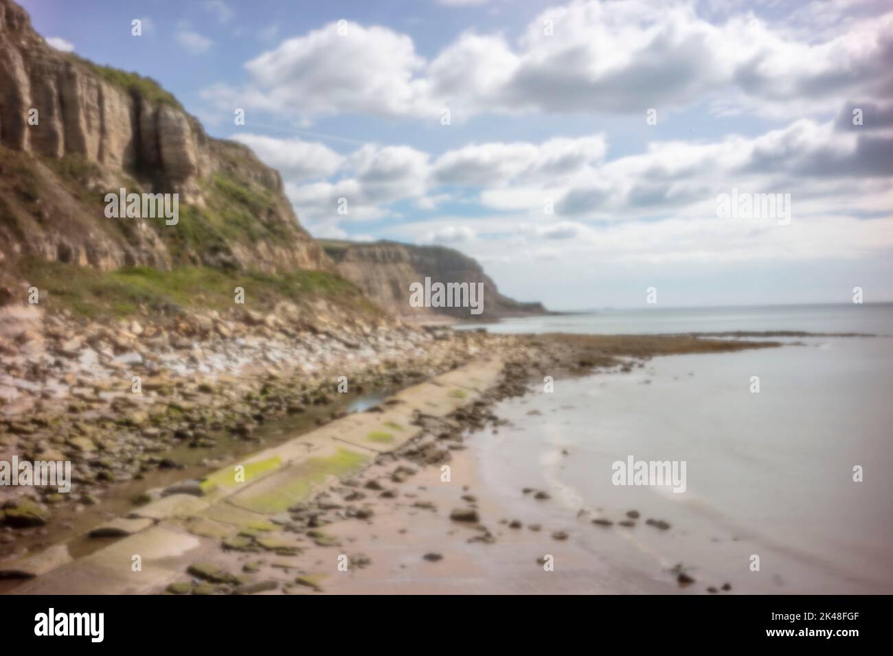 Stylised Rock a Nor beach and cliff landscape. Age-defying, digital age ...