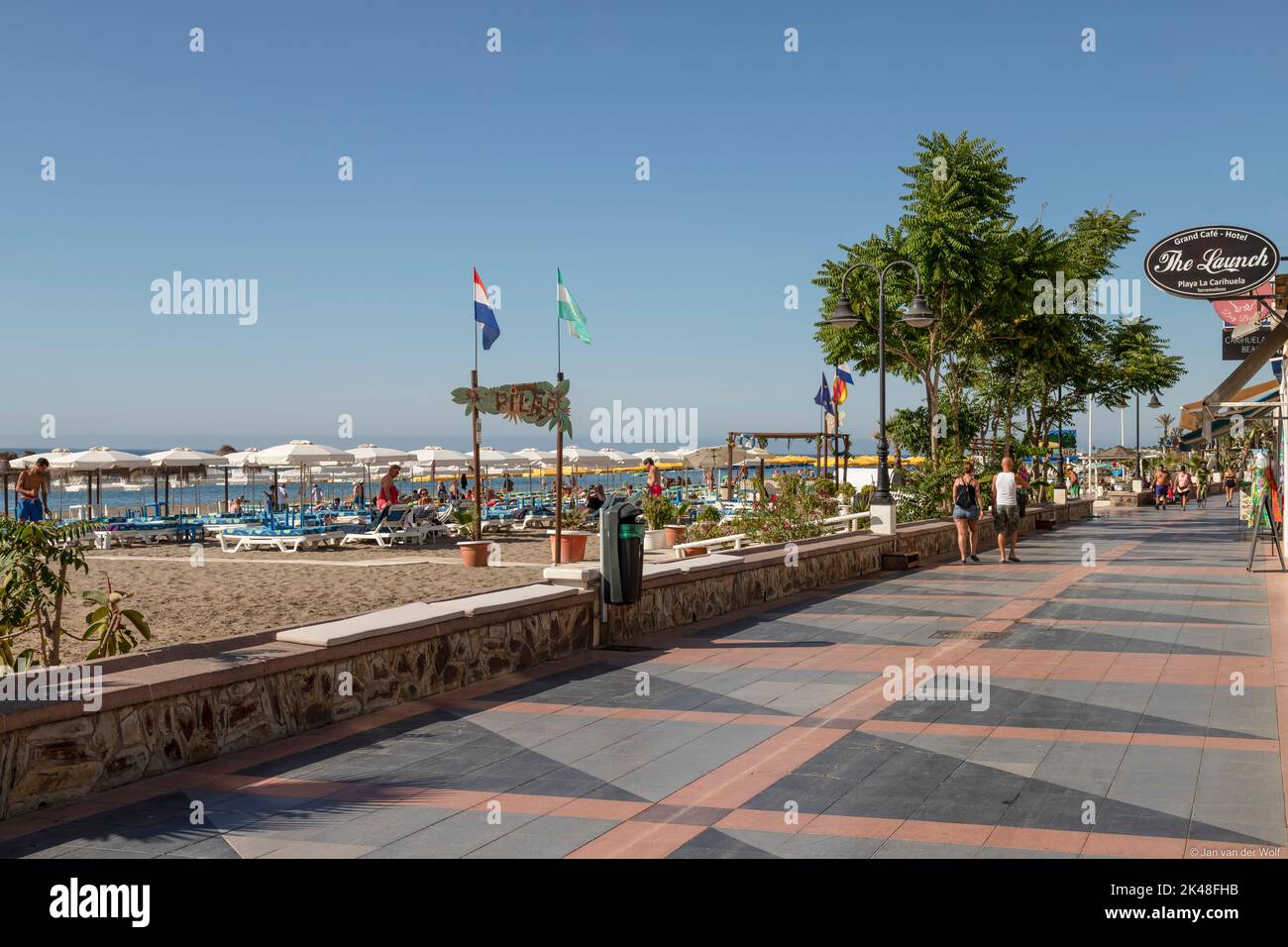 View of the popular Mediterranean resort of La Carihuela with its ...