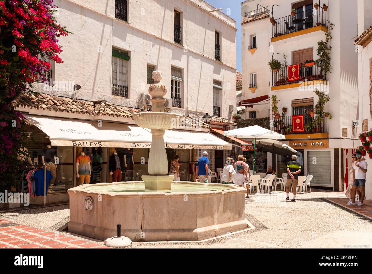 Cozy little square (plaza fernando alcala) with a fountain in the old ...