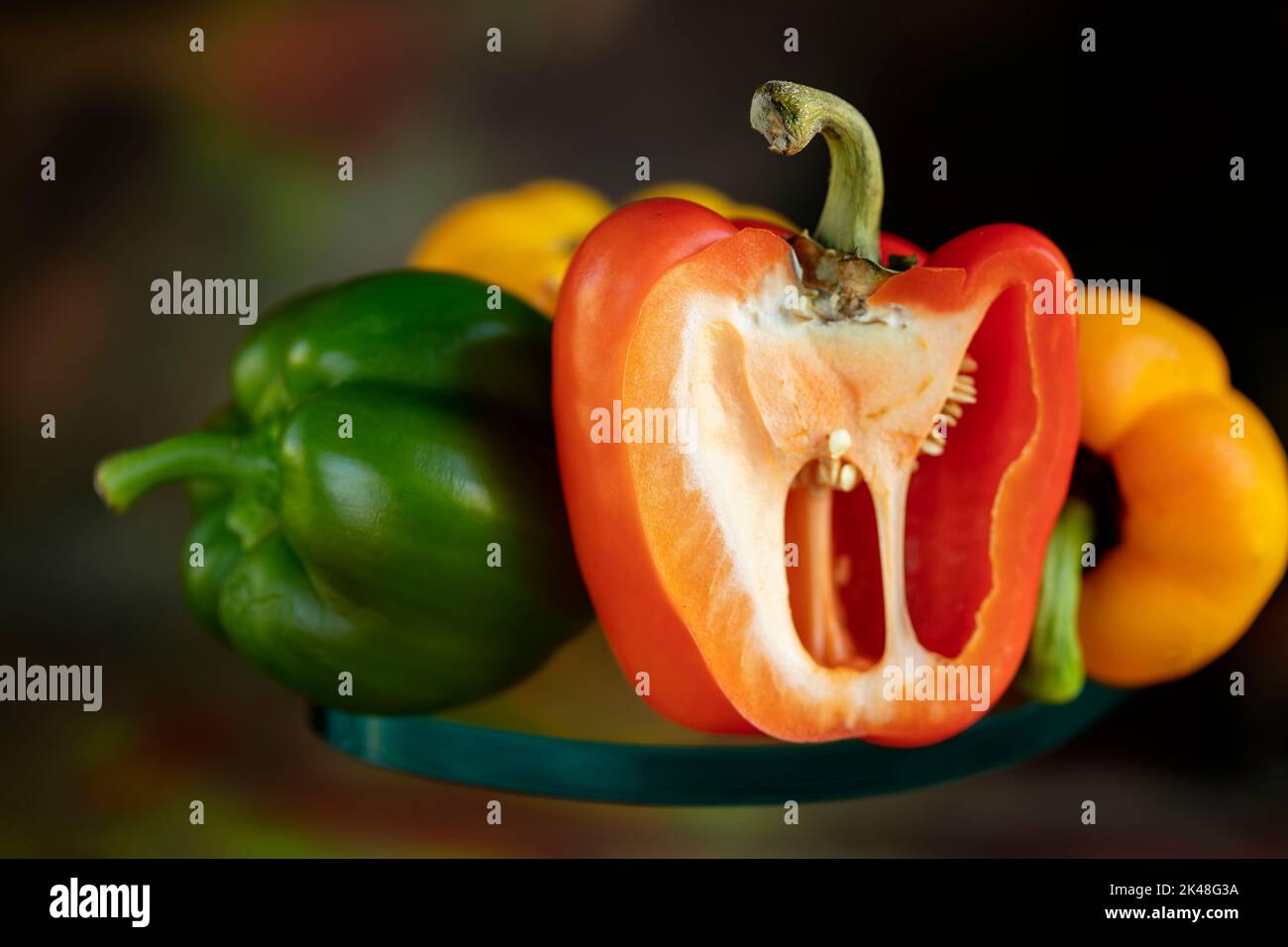 Colourful still life food representation of red. green and yellow Bell ...