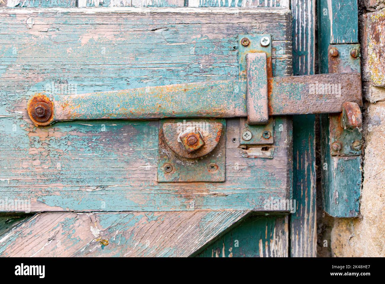An old Victorian door latch in a walled garden Stock Photo - Alamy