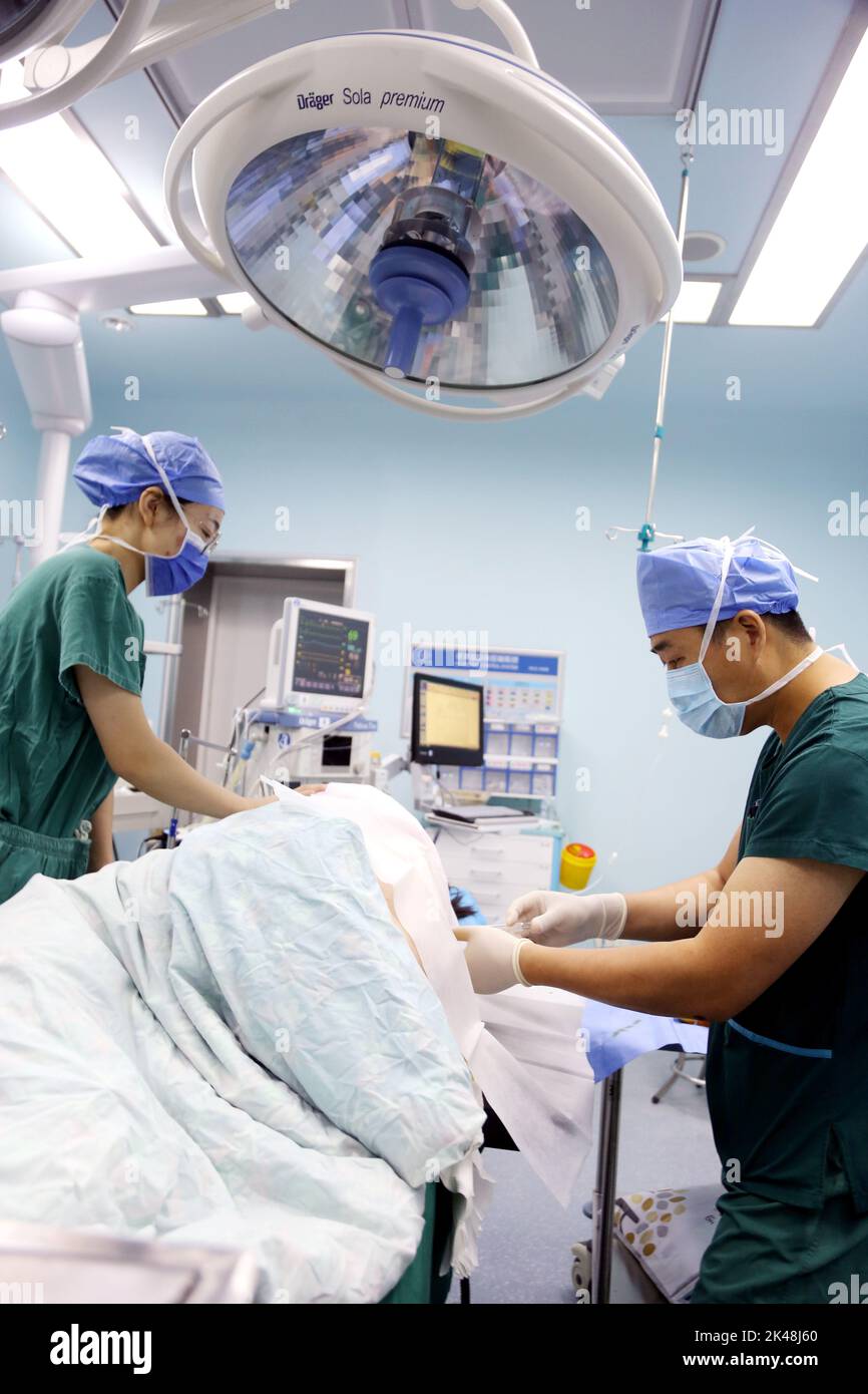 LIANYUNGANG, CHINA - OCTOBER 1, 2022 - An anesthesiologist performs ...