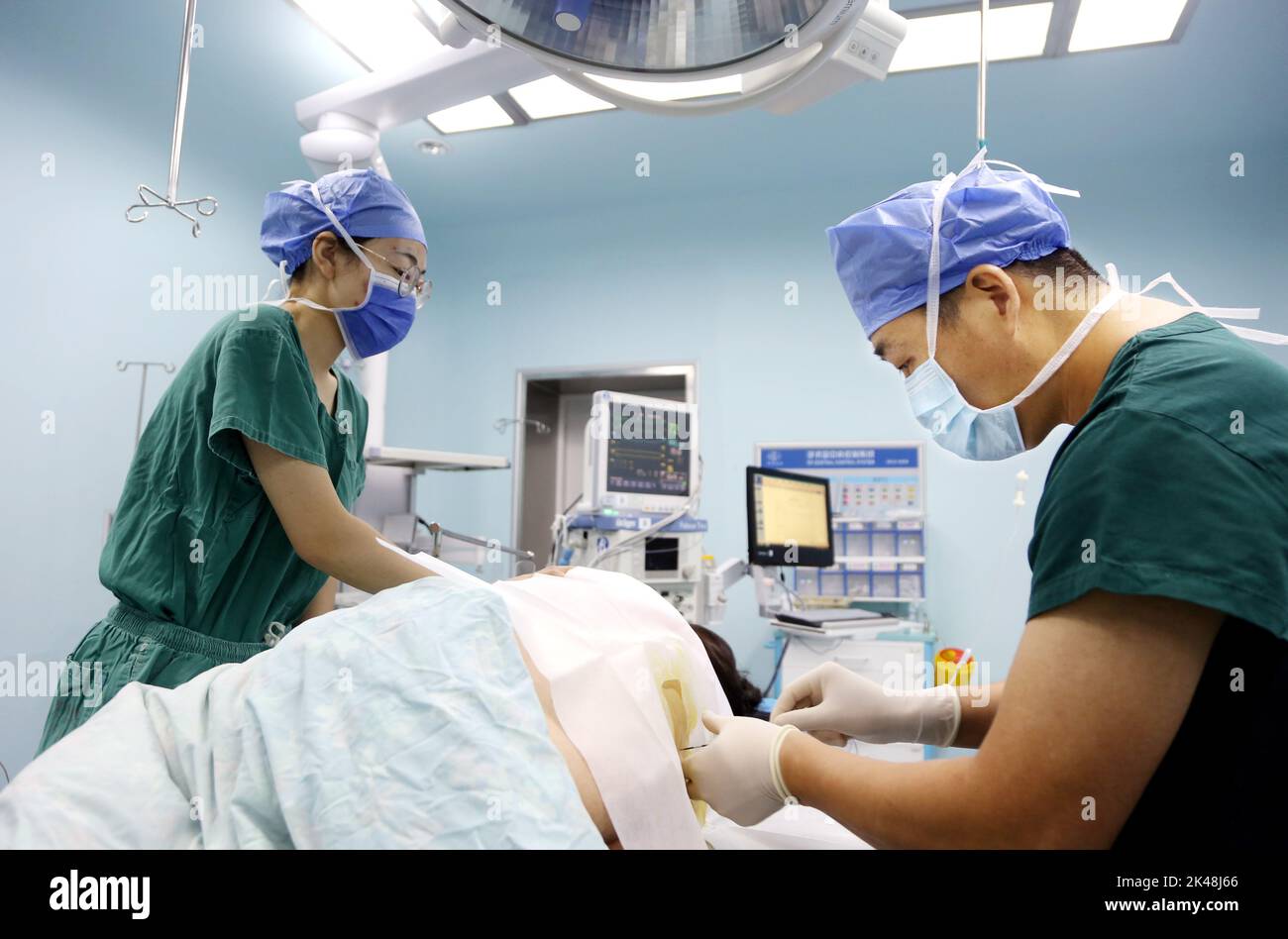 LIANYUNGANG, CHINA - OCTOBER 1, 2022 - An anesthesiologist performs ...