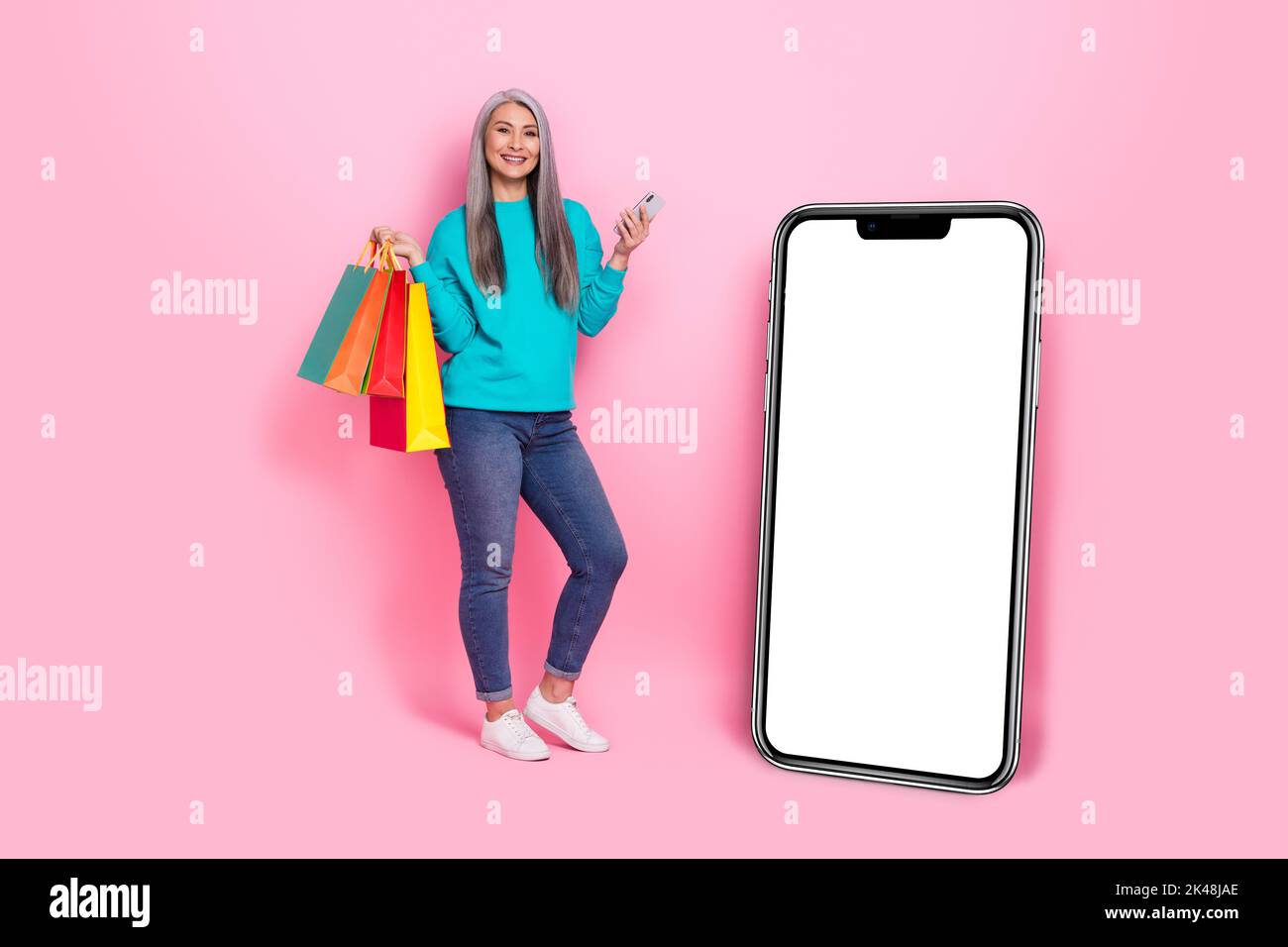 Photo of sweet attractive lady pensioner dressed blue pullover holding ...